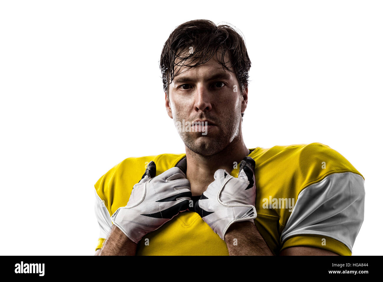 Football Player with a yellow uniform on a white background Stock Photo ...
