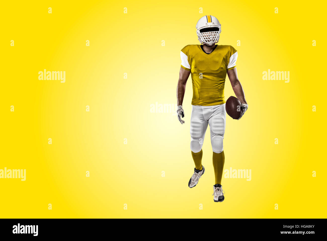 Football Player with a yellow uniform on a yellow background Stock ...