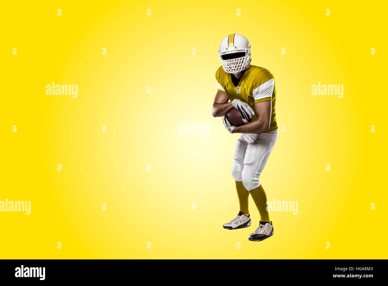 Football Player with a yellow uniform on a yellow background Stock ...