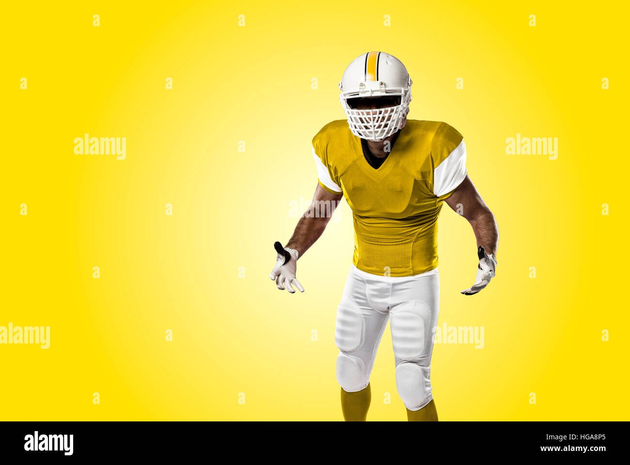 Football Player with a yellow uniform on a yellow background Stock ...