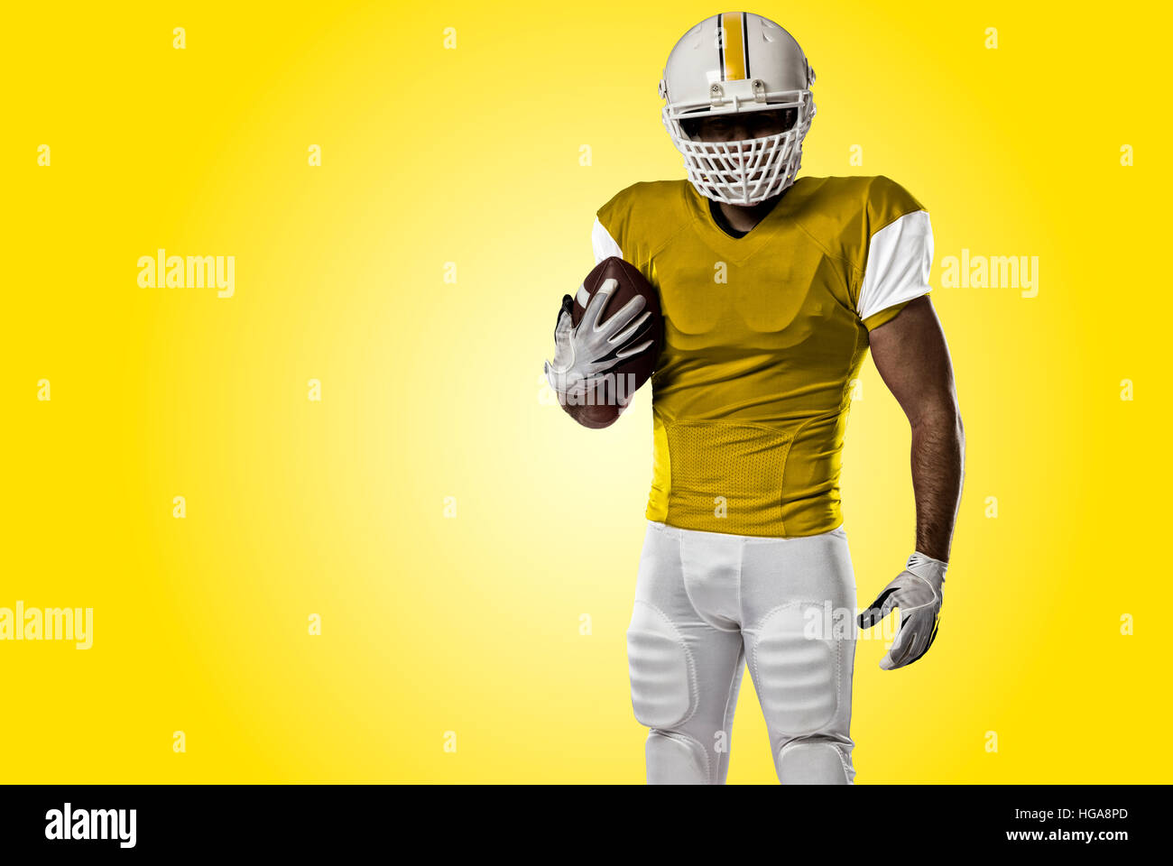 Football Player with a yellow uniform on a yellow background Stock ...