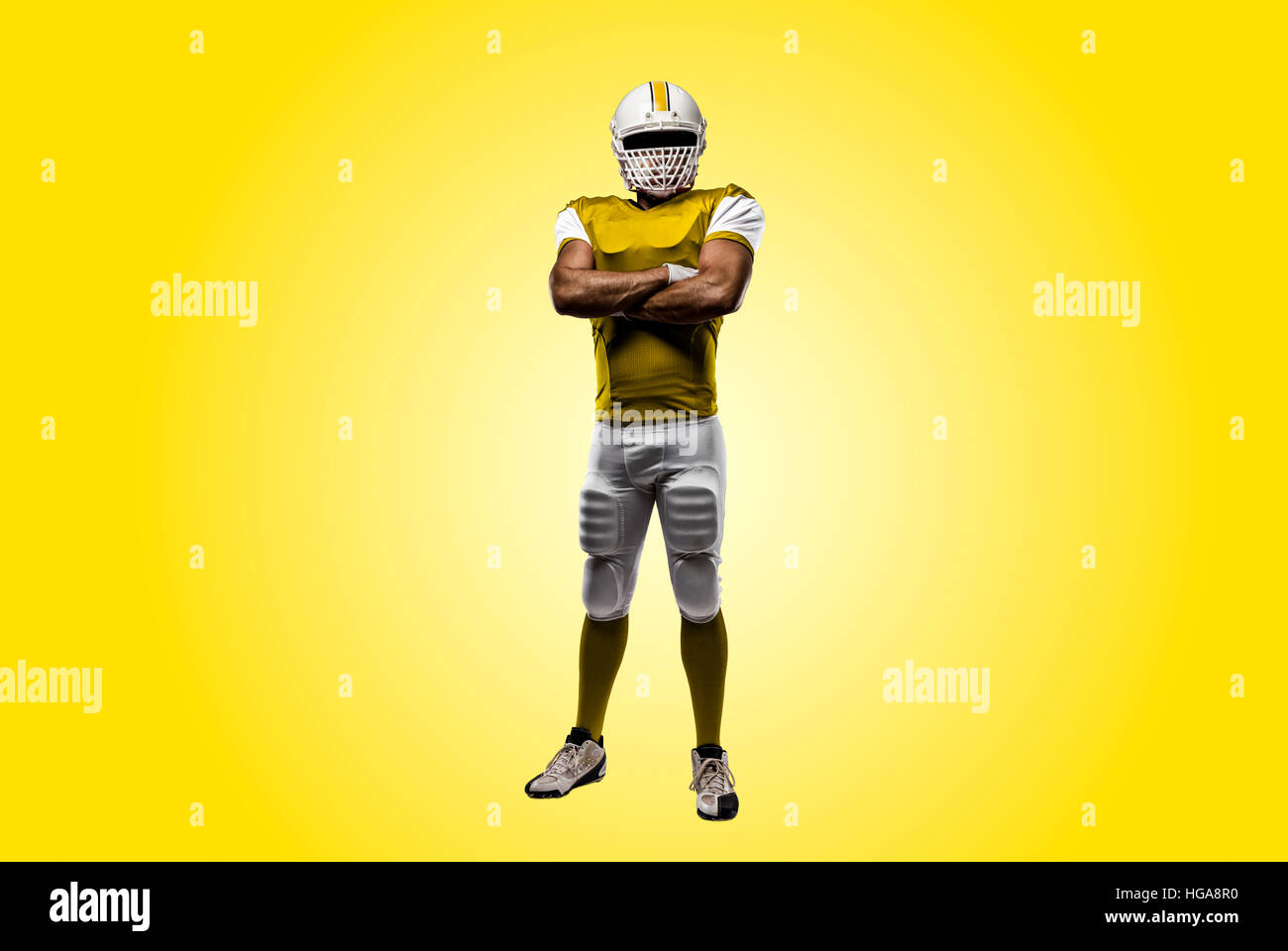 Football Player with a yellow uniform on a yellow background Stock ...