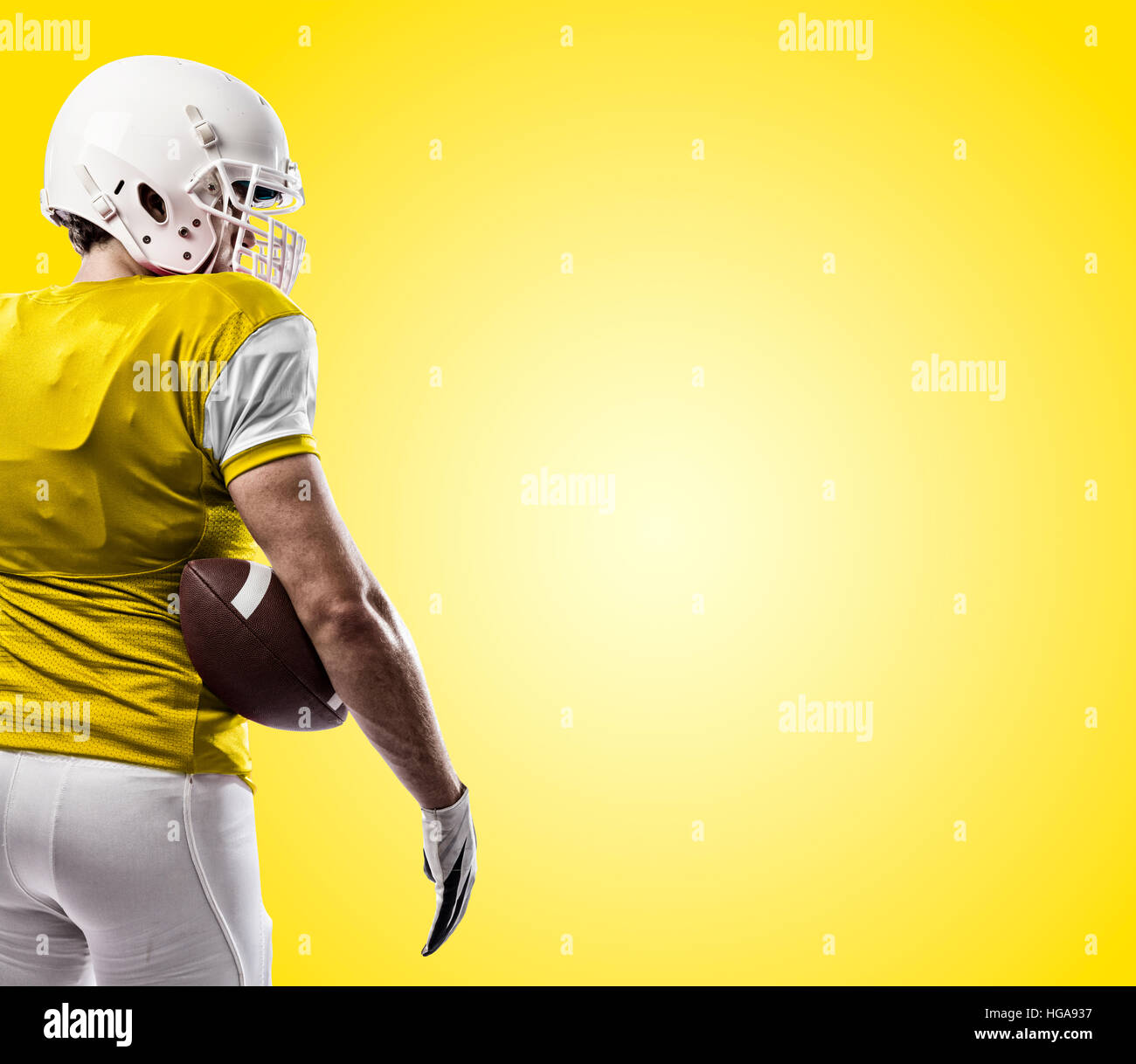 Football Player with a yellow uniform on a yellow background Stock ...