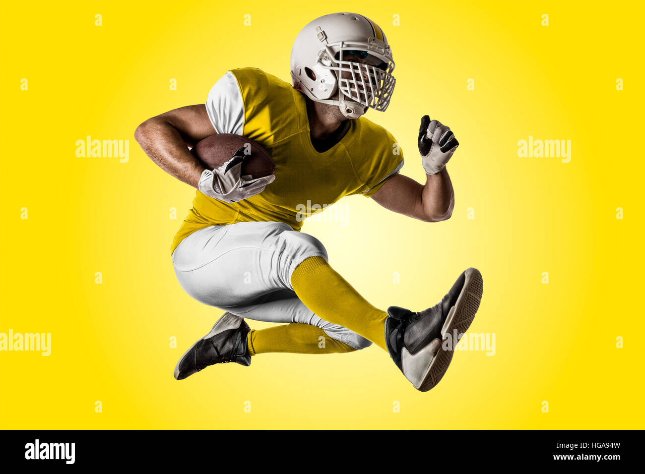 Football Player with a yellow uniform Running on a yellow background ...