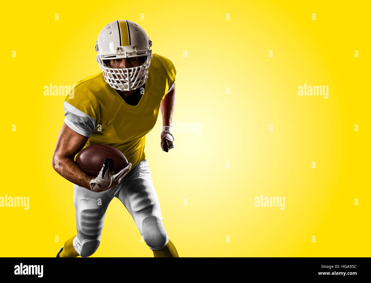 Football Player with a yellow uniform Running on a yellow background ...