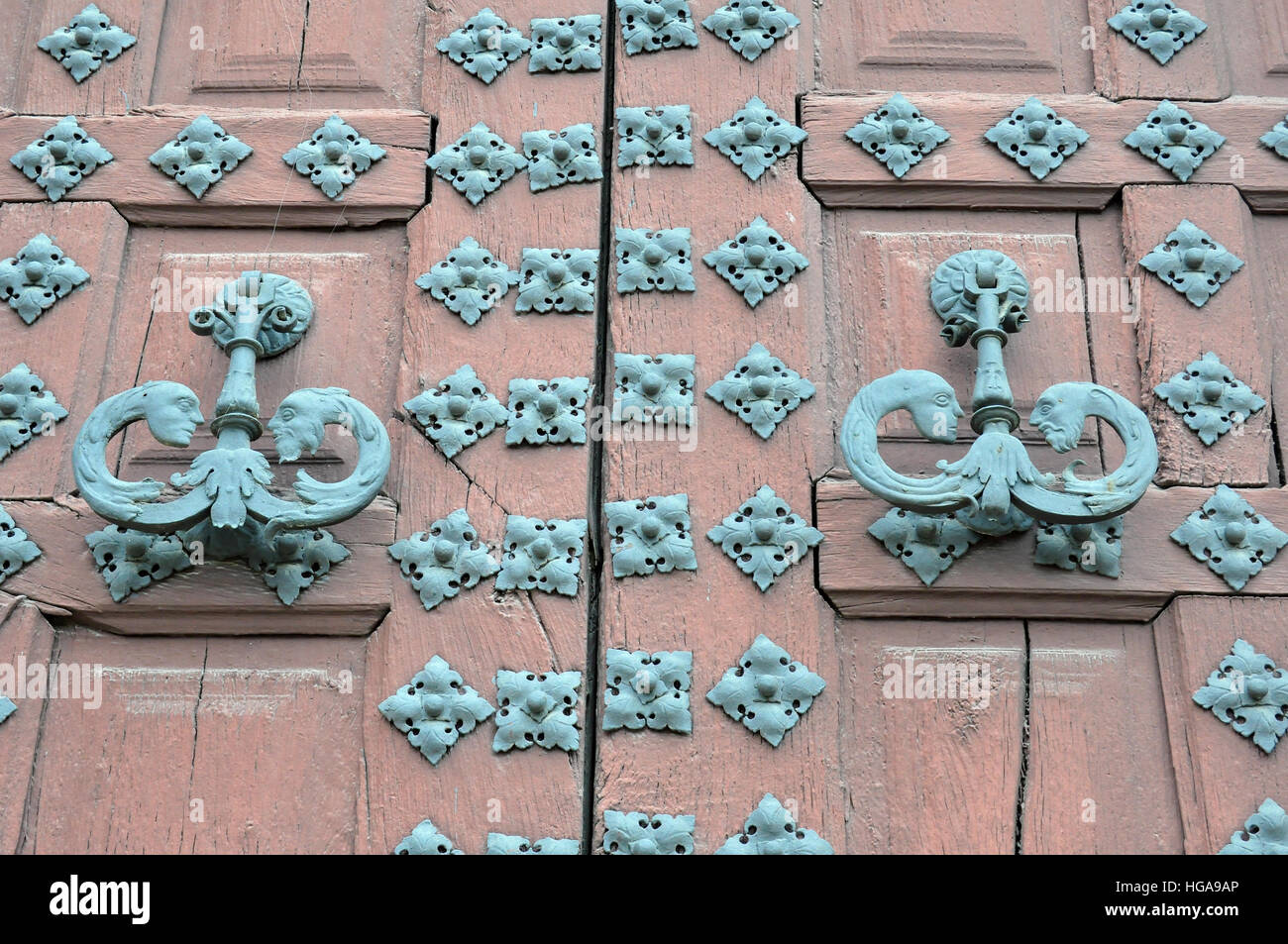 renaissance nails and wooden door Stock Photo - Alamy