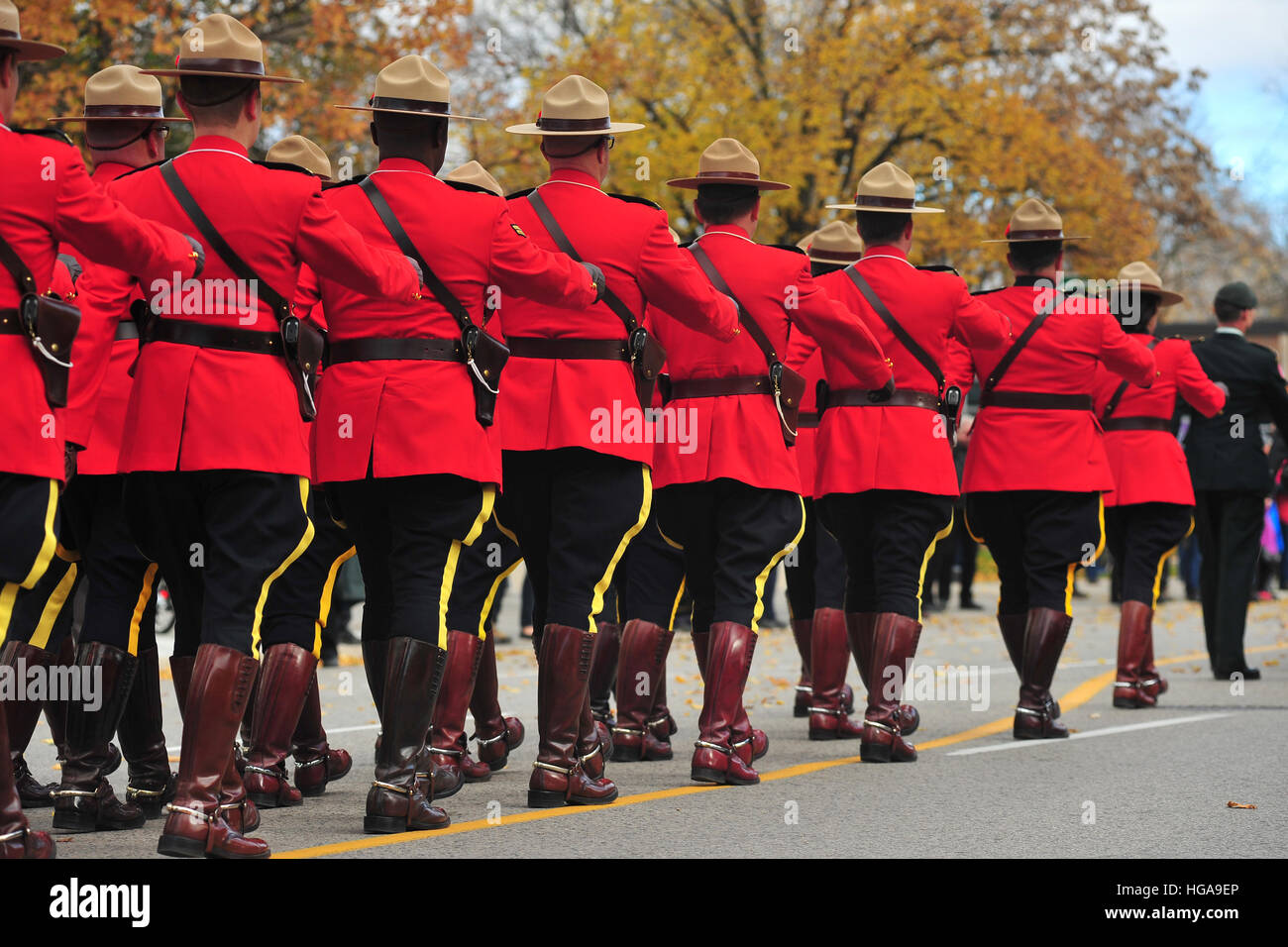 Canadian Mounties marching after a remembrance ceremony in London ...