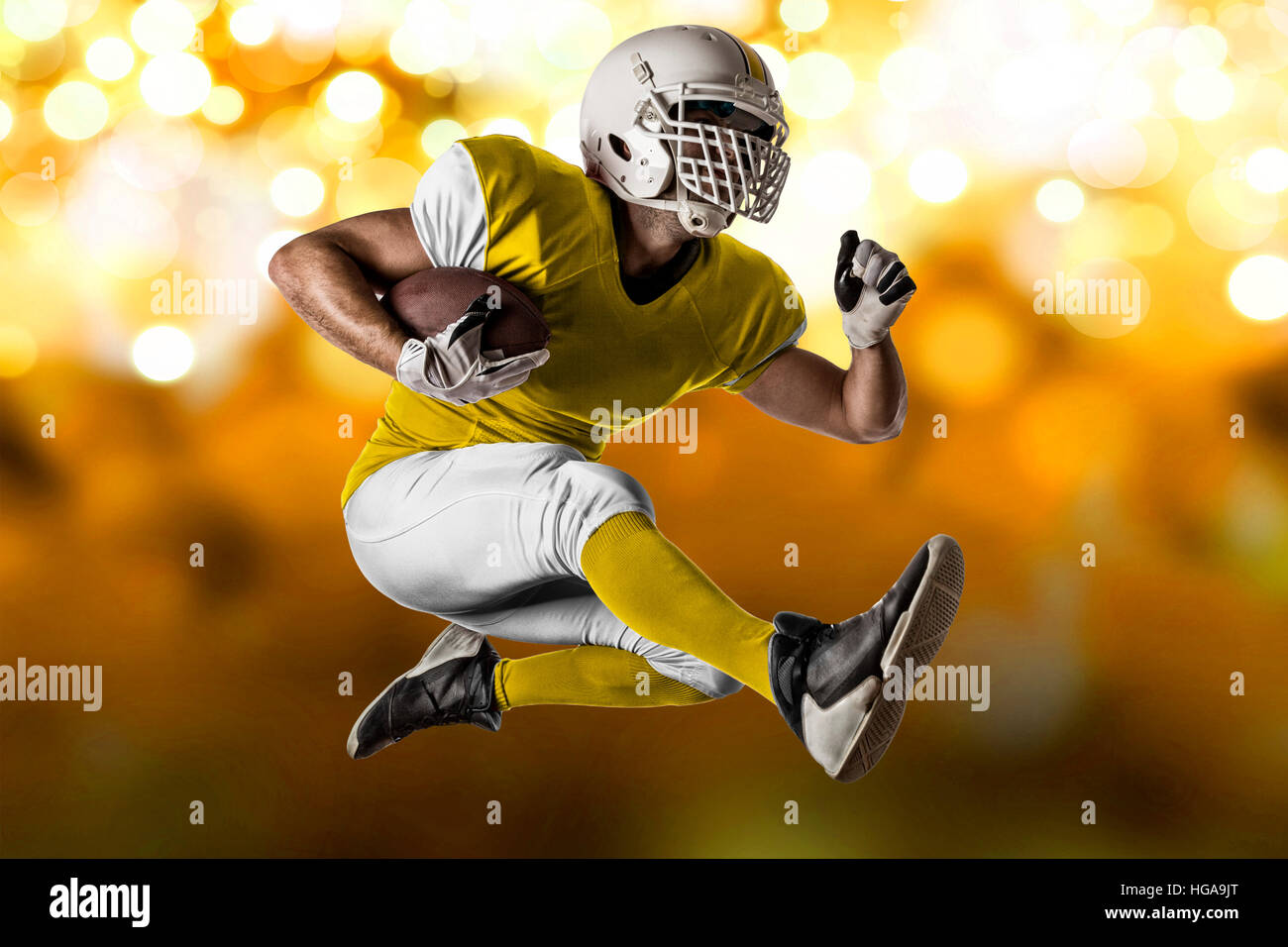 Football Player with a yellow uniform Running on a yellow lights ...