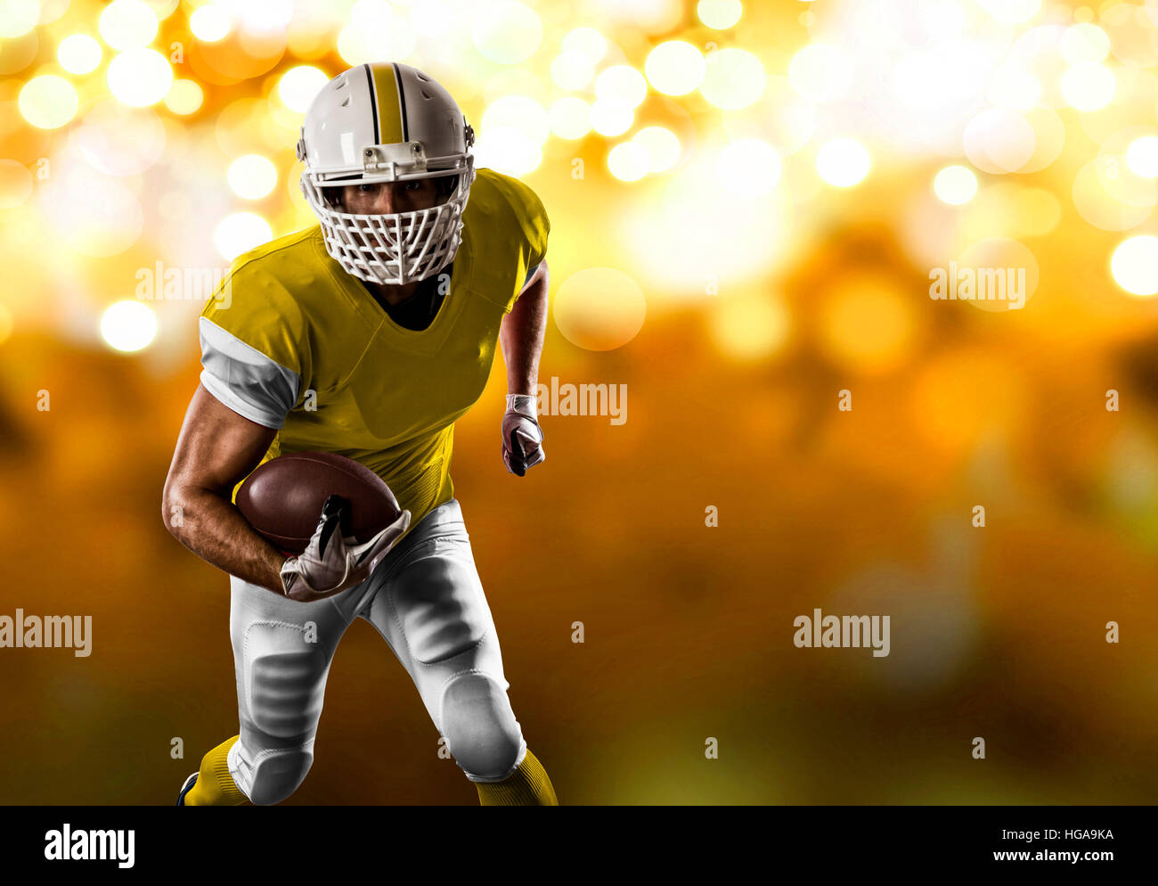 Football Player with a yellow uniform Running on a yellow lights ...