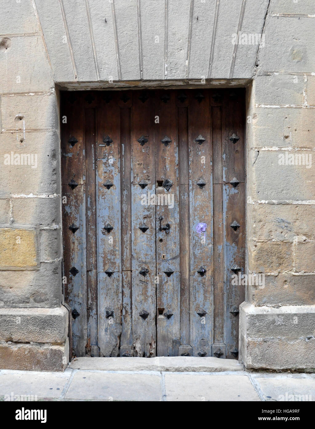 renaissance blacksmith's nails and wooden door Stock Photo - Alamy