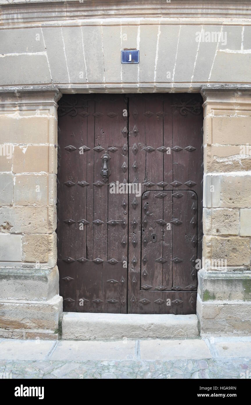 renaissance blacksmith's nails and wooden door Stock Photo - Alamy