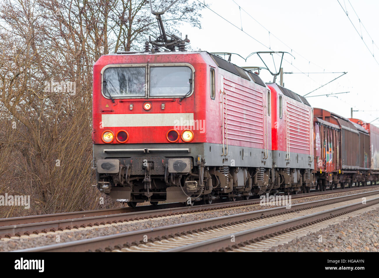 german cargo train drives on tracks to freight yard Stock Photo - Alamy