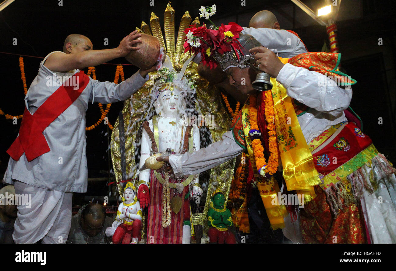 Kathmandu, Nepal. 6th Jan, 2017. Priests bathe an idol of Seto ...