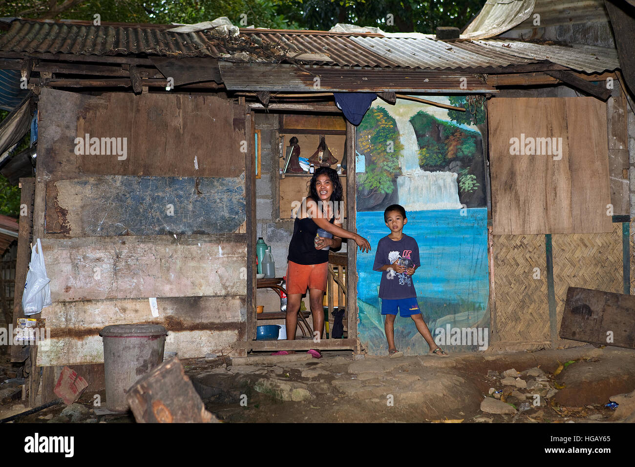 Asian Woman And Son Live In Their Squatter Home Made From Salvaged