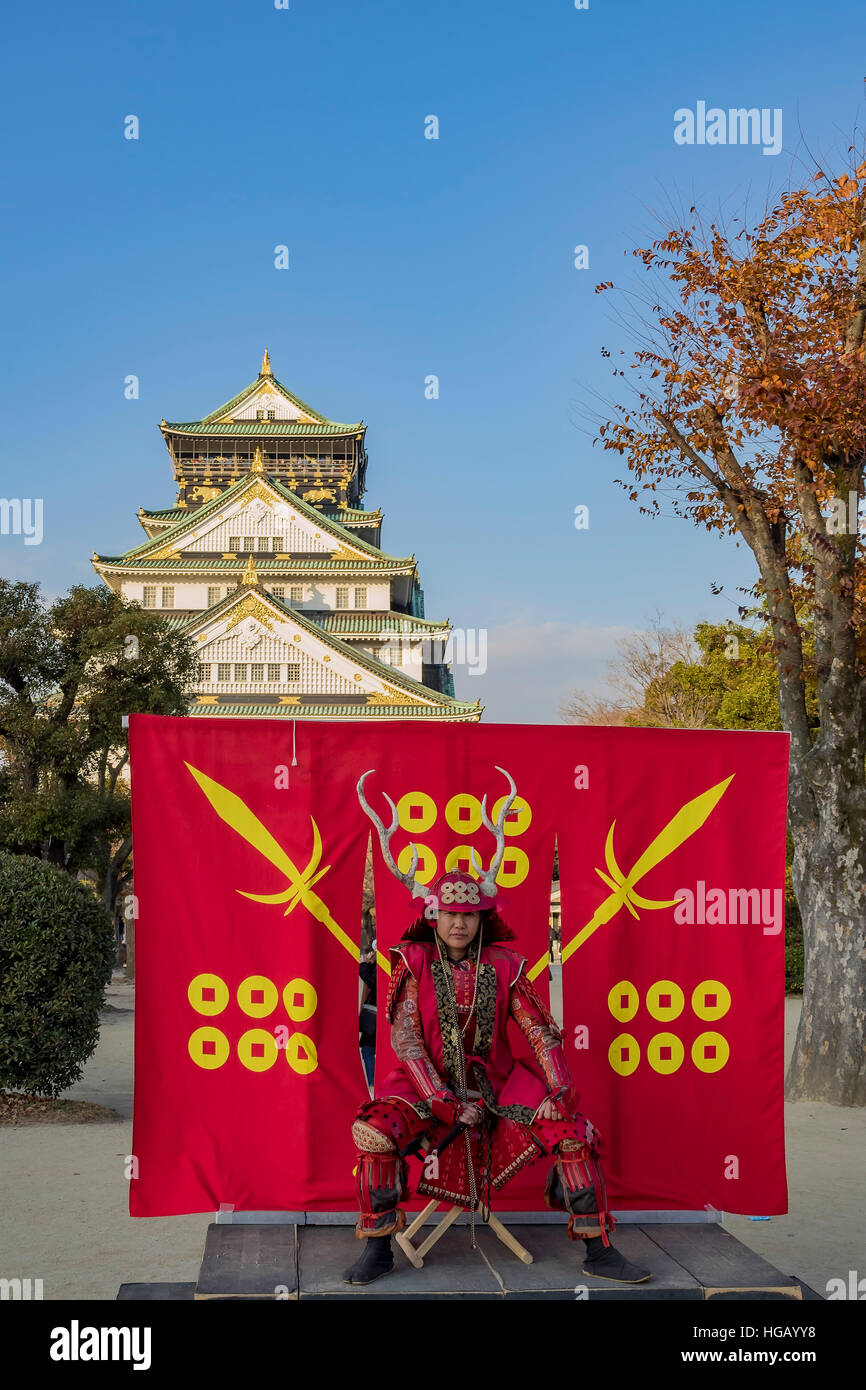 Osaka, DEC 19: Red warrior and the famous Osaka Castle on DEC 19, 2016 ...