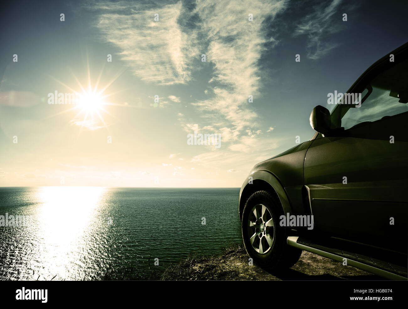 jeep on the sea cliff Stock Photo - Alamy