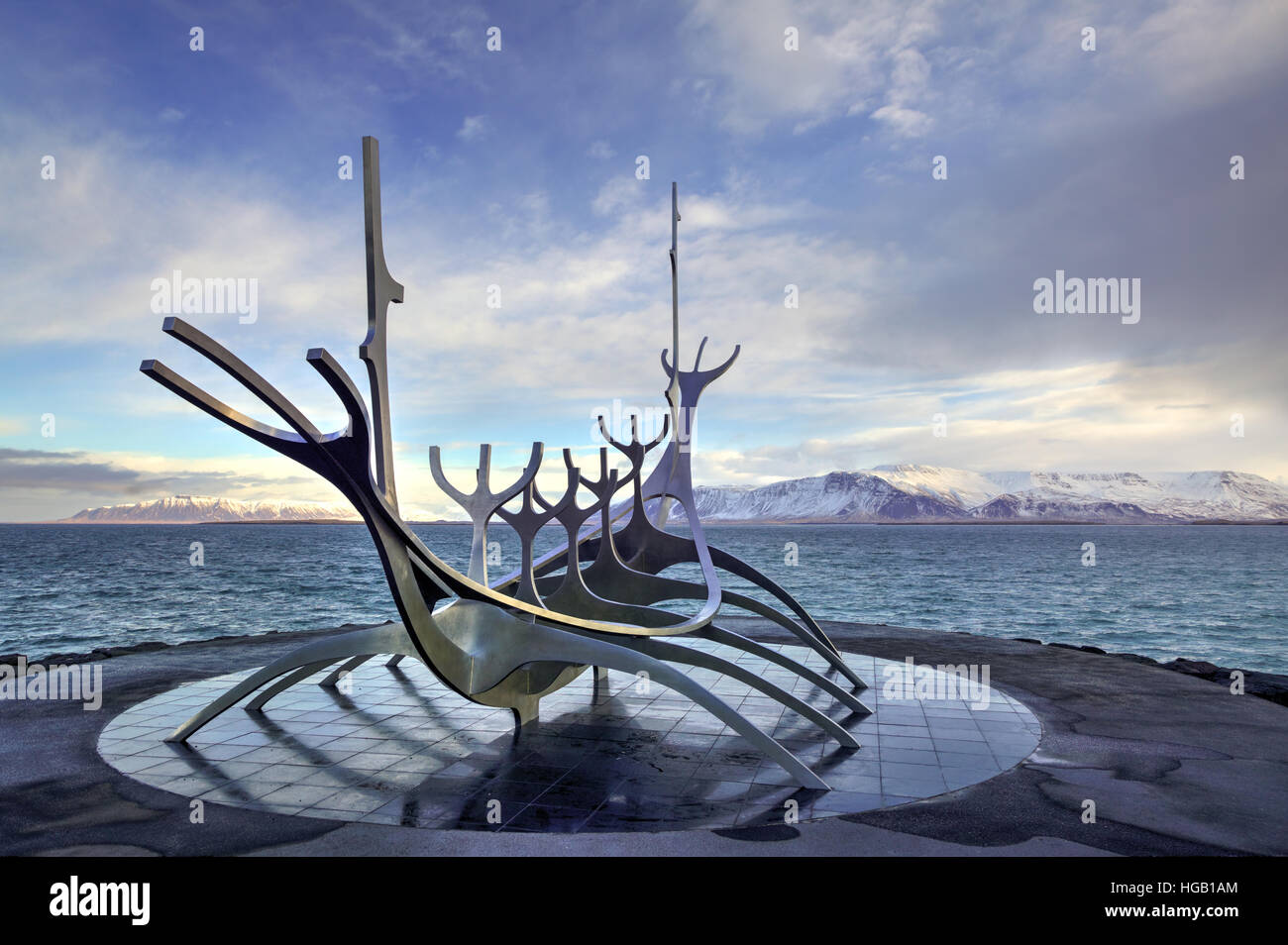 The Sun Voyager, a stainless-steel sculpture of a boat, at edge of Faxa ...