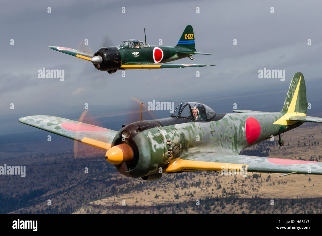 A Japanese A6M Zero and a Ki-43 Oscar fly above Madras, Oregon Stock ...
