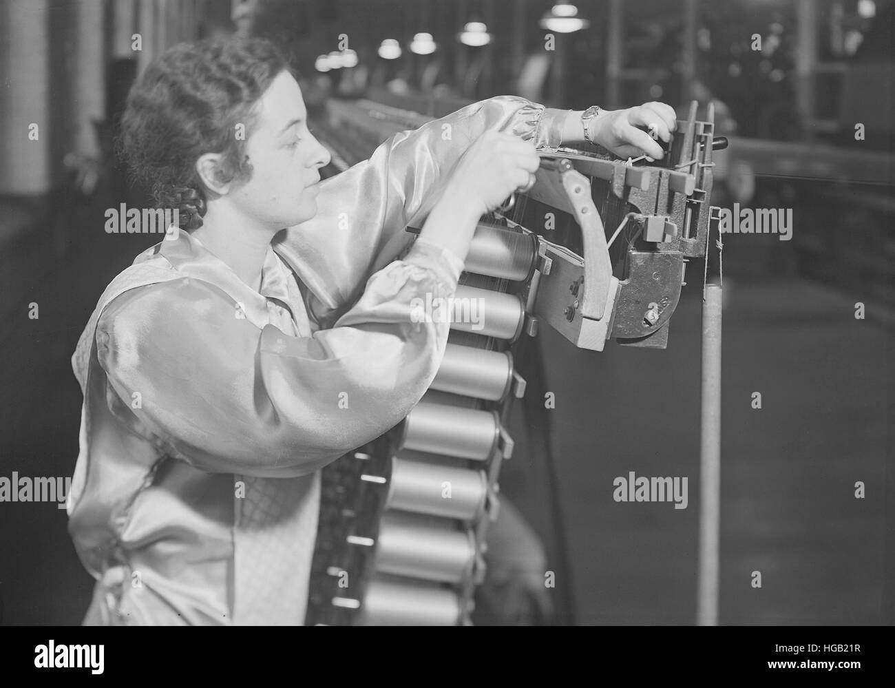 Spool creel and warper at the William Skinner and Sons Silk Mill, 1936 ...