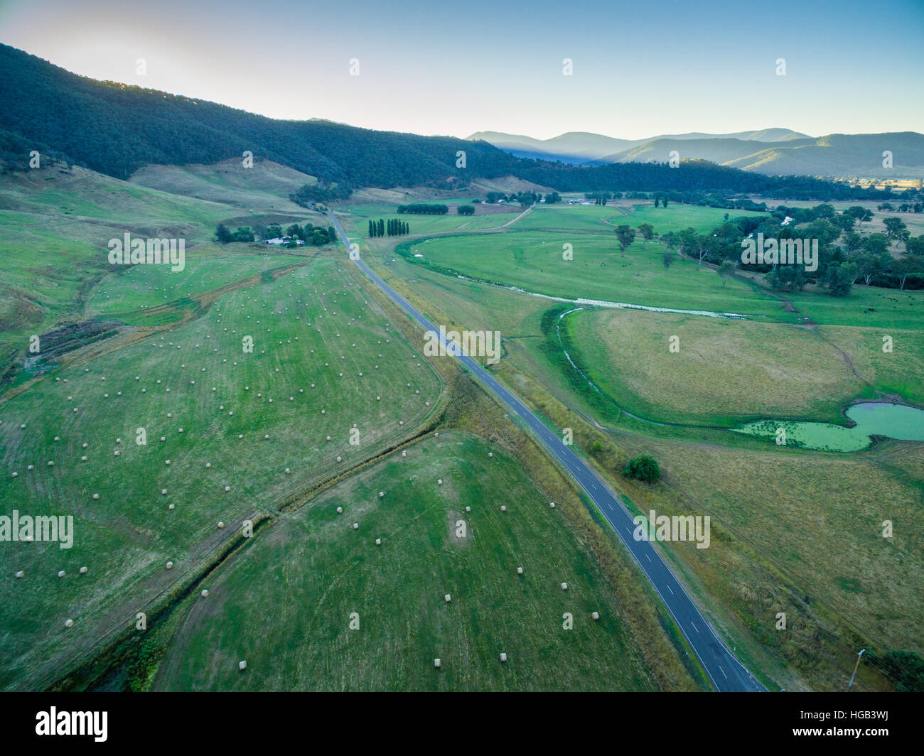 Aerial view of road through Australian backcountry at sunset Stock ...