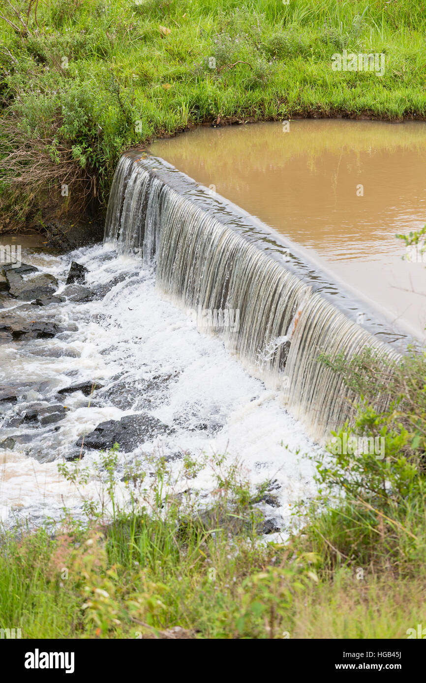 Small artificial waterfall in park hi-res stock photography and images ...