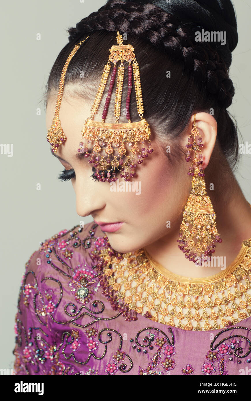 Beautiful Asian bride looking down Stock Photo - Alamy