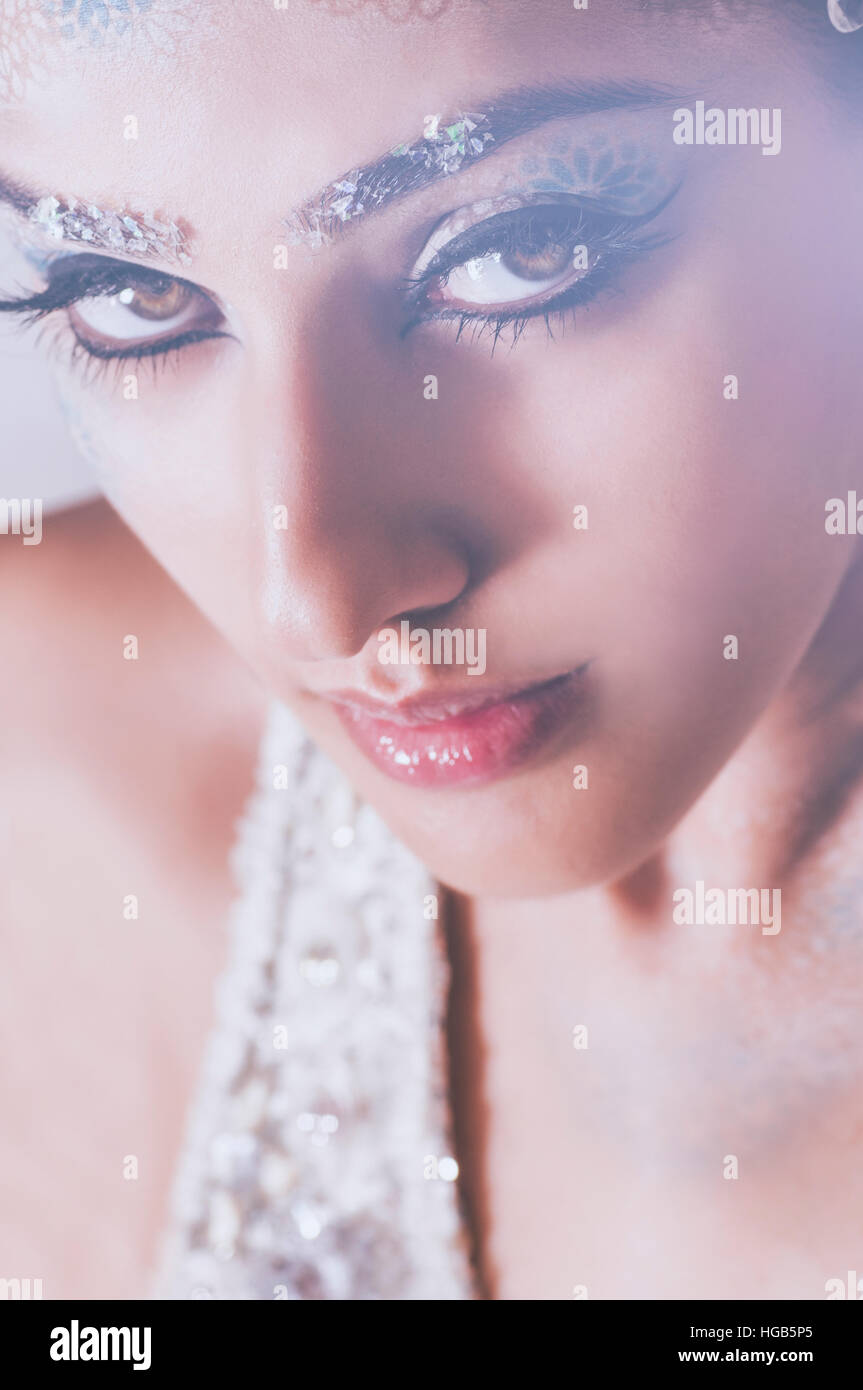 Beautiful woman staring Stock Photo - Alamy