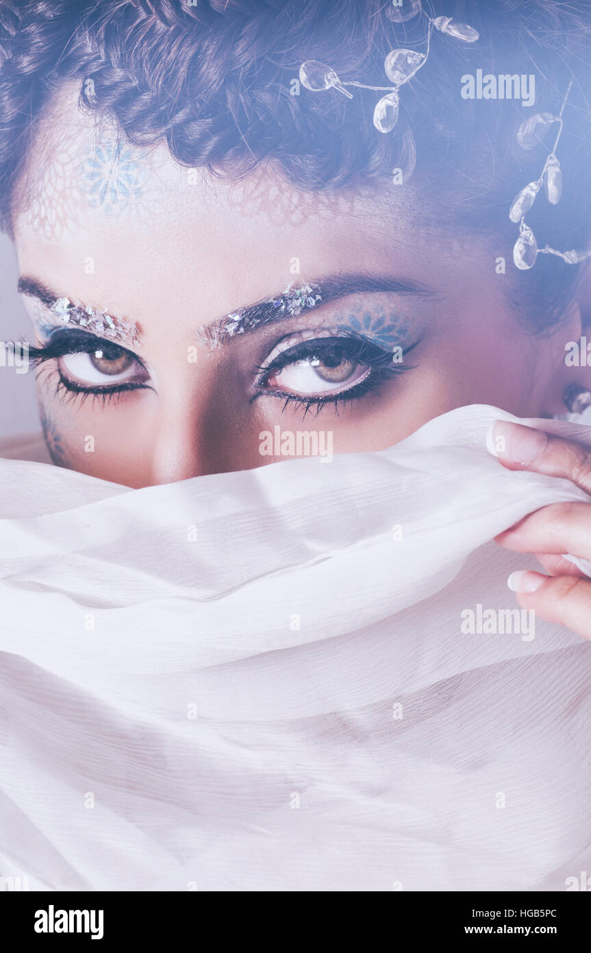 Beautiful indian woman hiding face hi-res stock photography and images ...