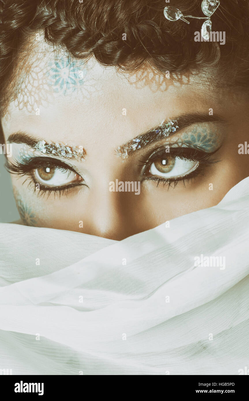 Beautiful woman hiding her face Stock Photo - Alamy