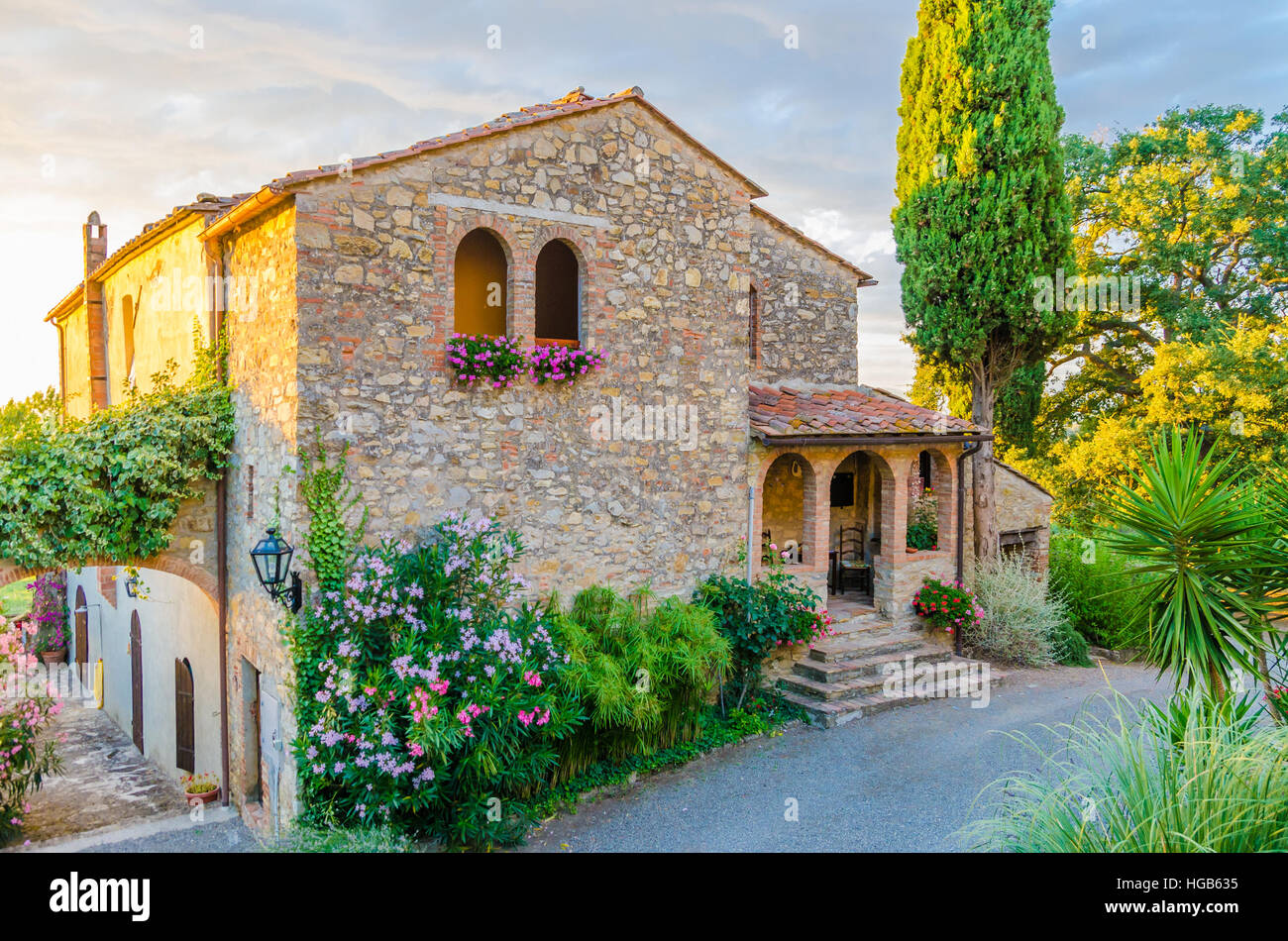 Beautiful old Itanlian stone house with arched windows and typical ...