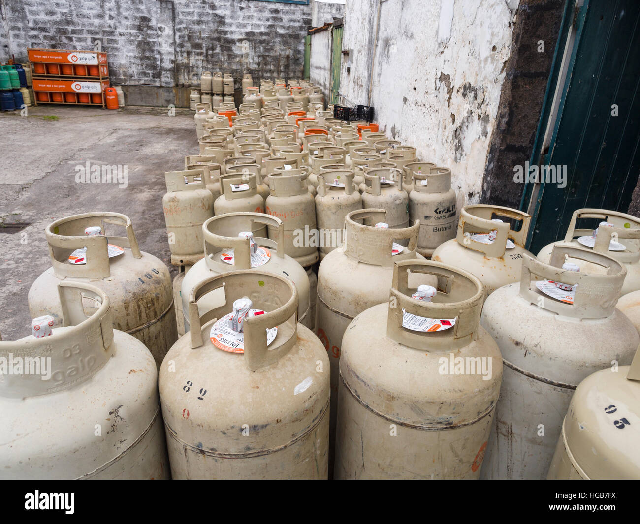 Butane Tanks in Storage. A large number of Butane gas tanks in a rough storage yard. Rua Conego ...