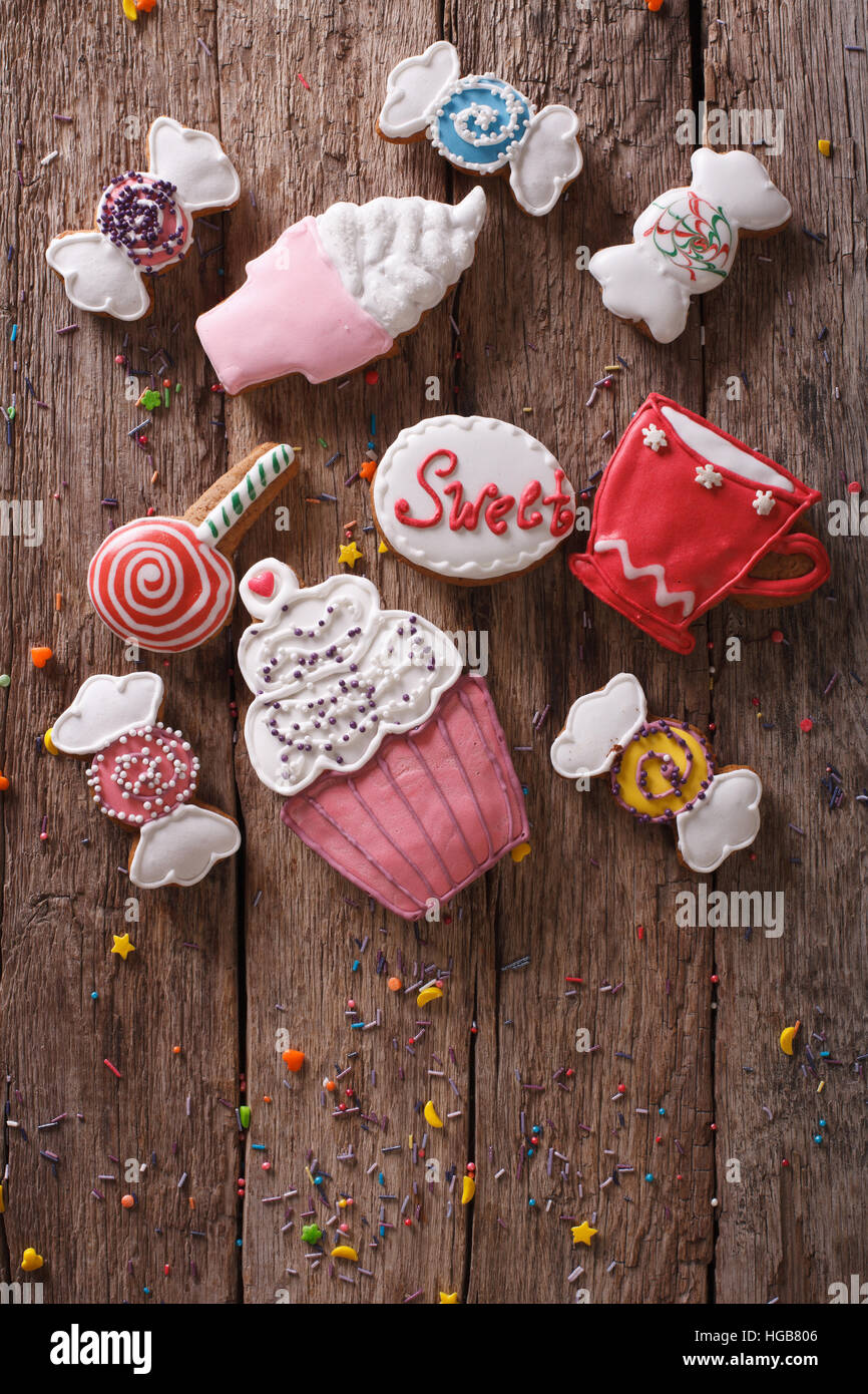 gingerbread sweets close-up on the table. Vertical top view background ...