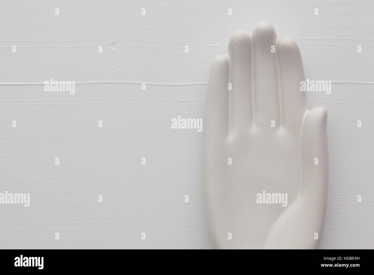 Detail of artifical hand on the wooden desk Stock Photo - Alamy