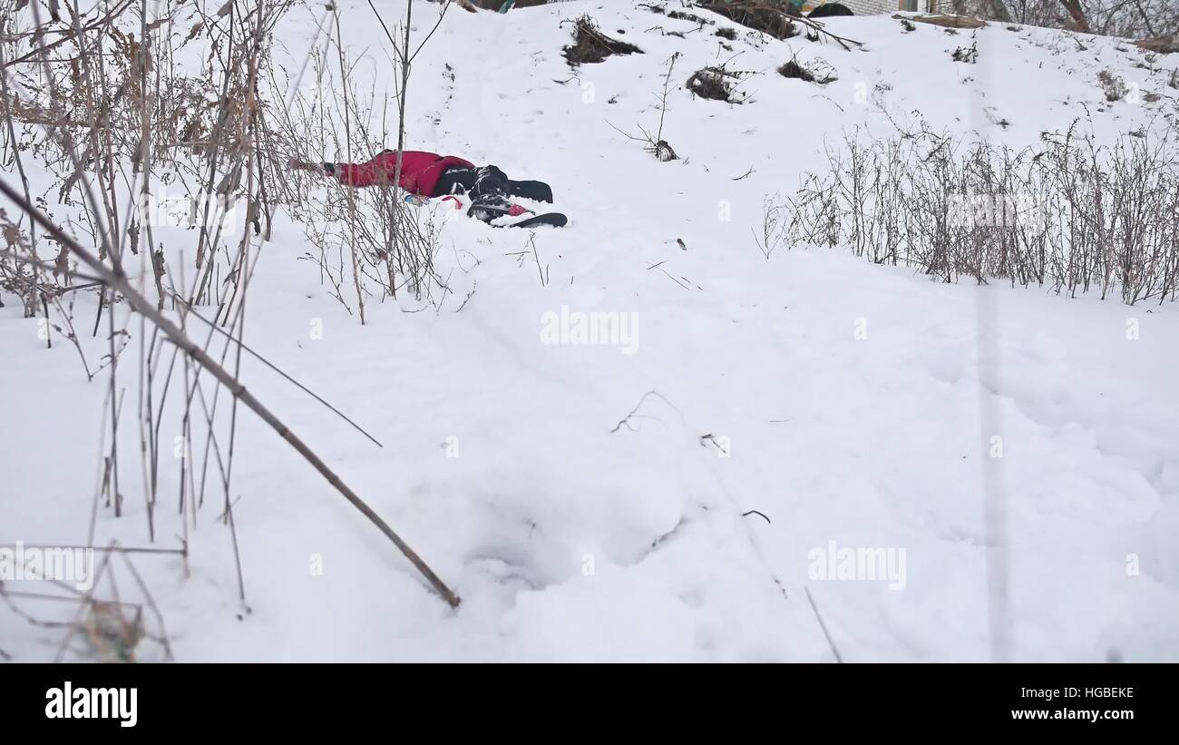 boy snowboarding fall rolling in sport the snow with holidays winter ...