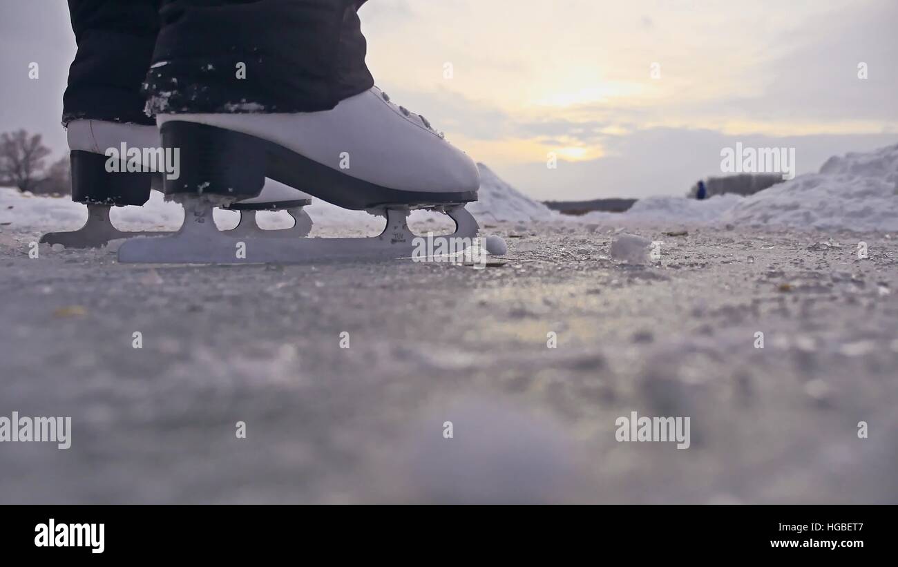 People skate on the skating rink in the winter on ice, active winter ...