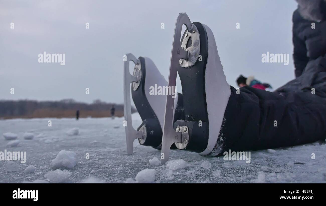 People skate on skating rink in the winter on ice, active winter a ...