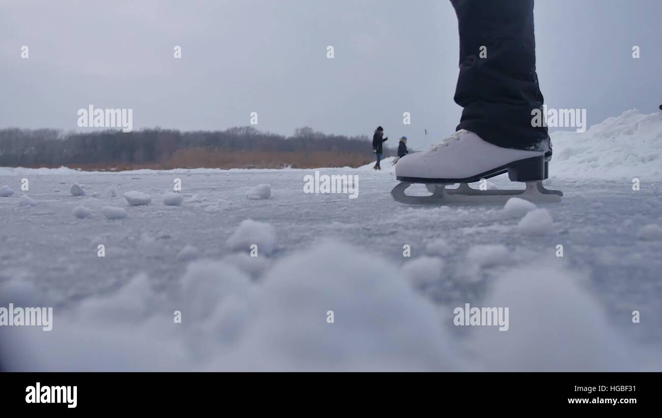 girl skating on ice, winter beautiful sport view, winter a holidays ...