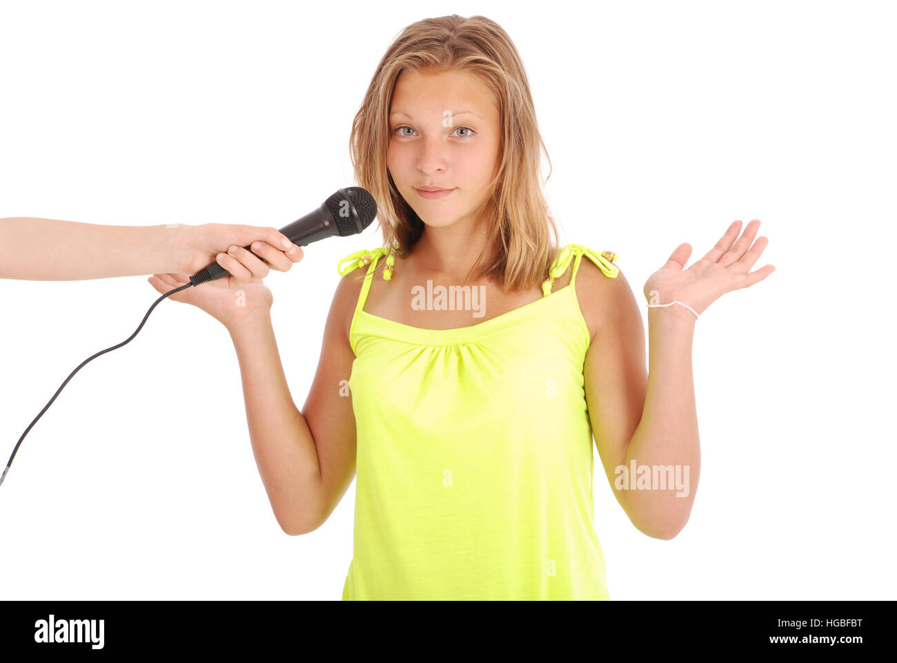 The teenage girl's interview isolated on white background Stock Photo ...