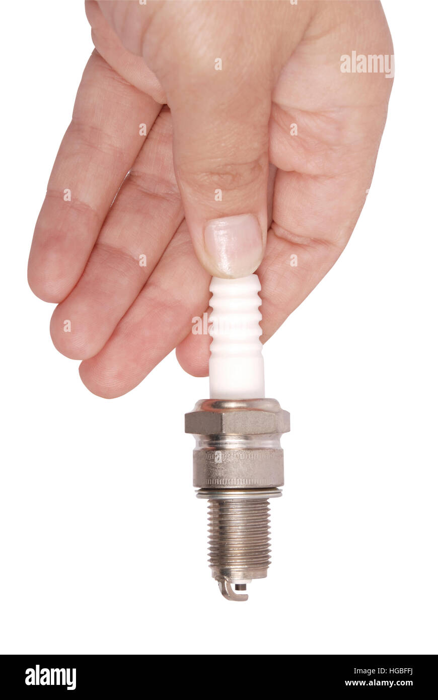 New sparking plug in a hand on a isolated white background. Photo with ...