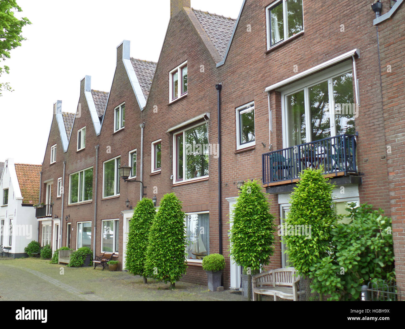 Dutch Style Dark Brown Brick Wall with White Decoration Houses ...