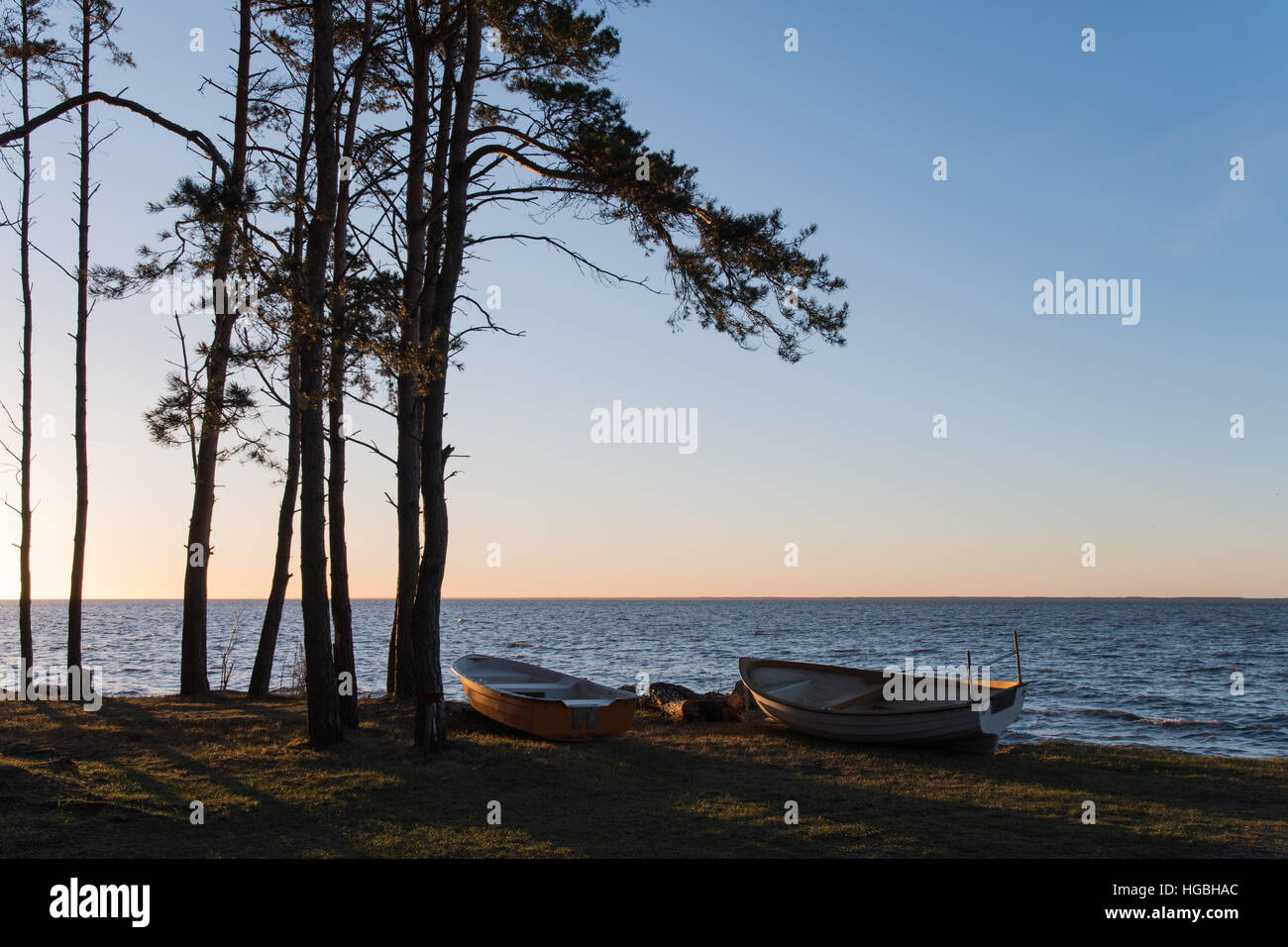 Small rowing boats on land by the coast of the swedish island Oland ...