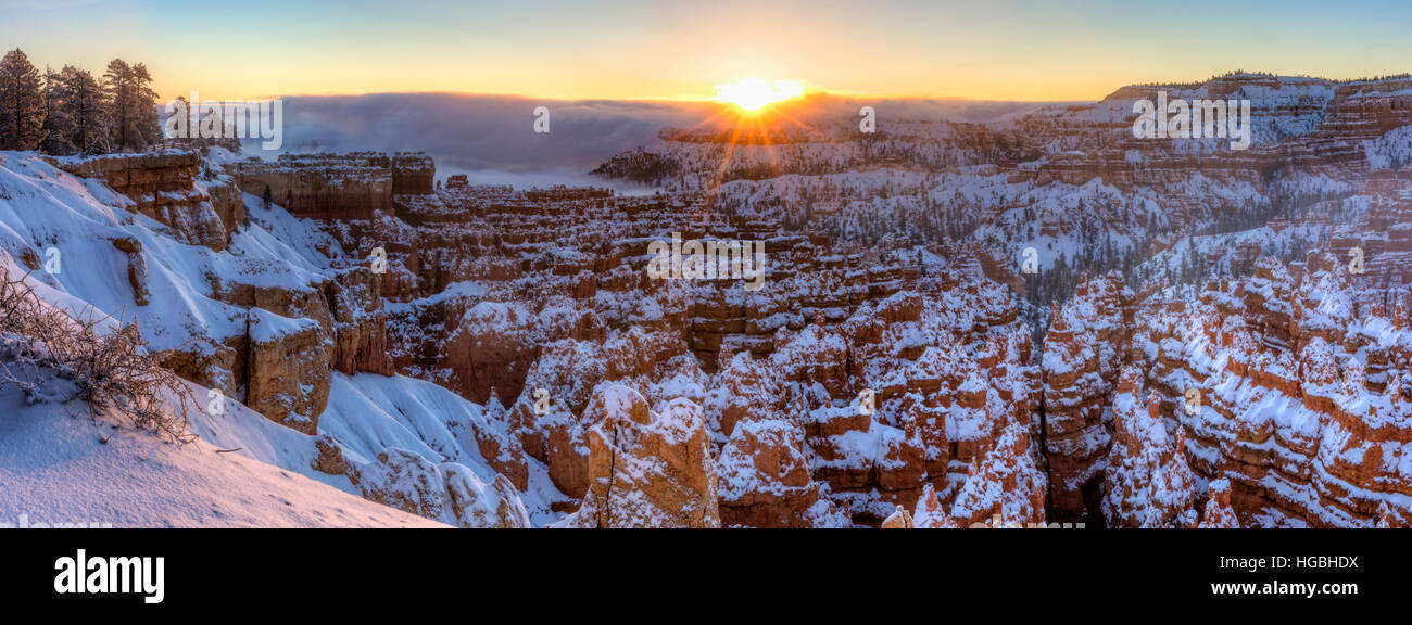 The sun rises out of the a fog bank over the Silent City of snow ...