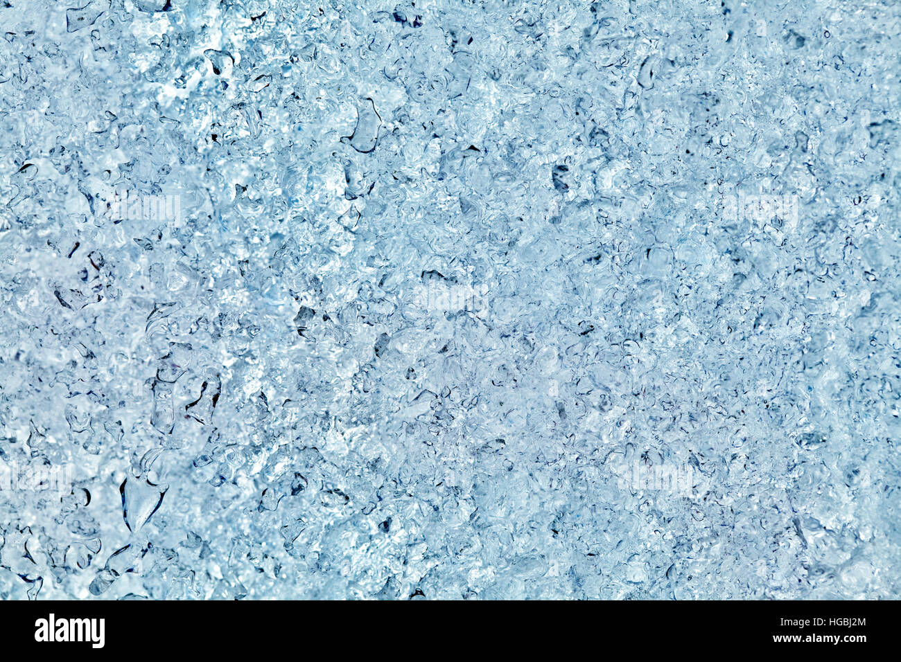 Block of blue smooth melting ice, close-up Stock Photo - Alamy
