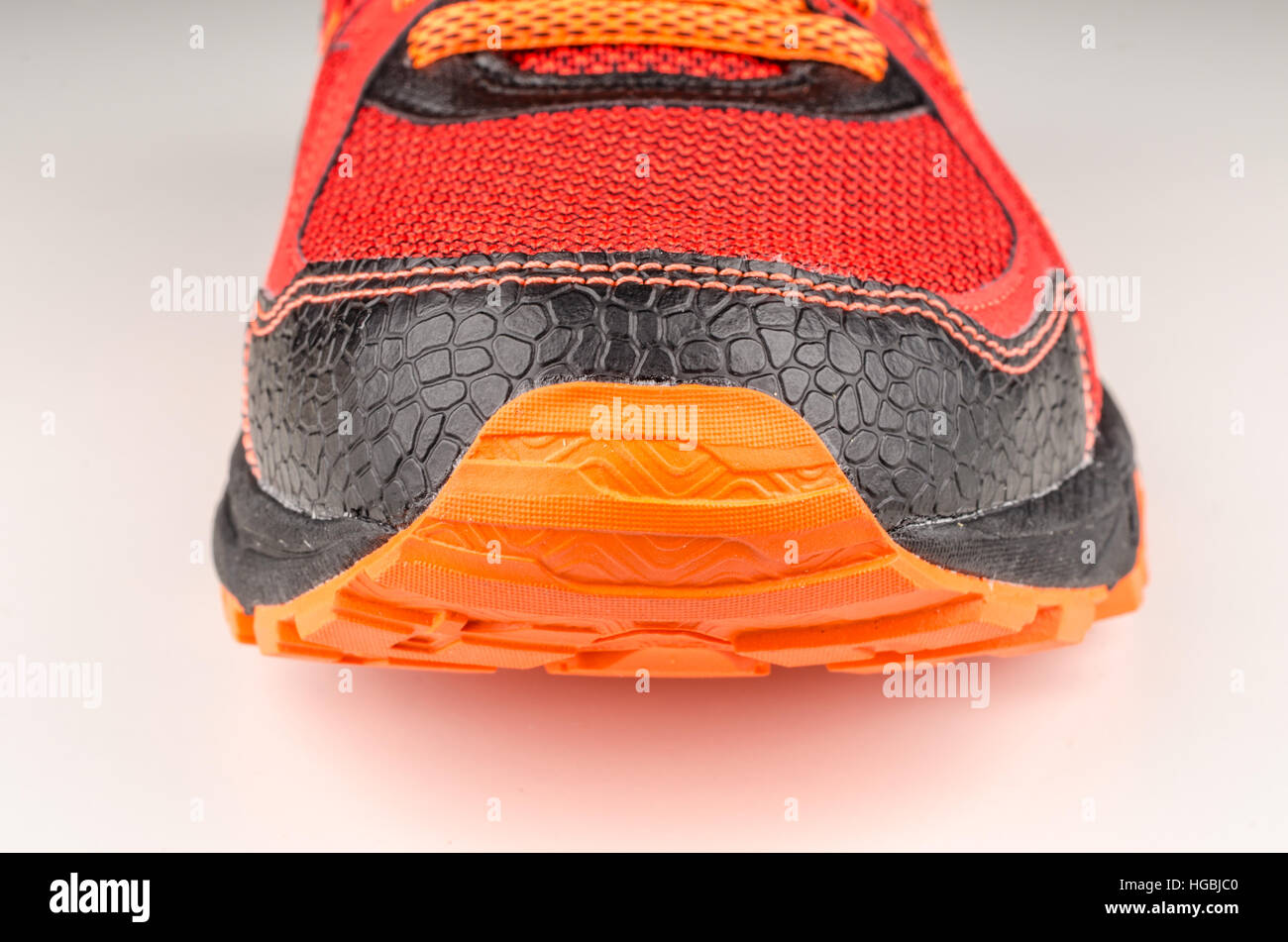 Front view of a cross country running shoe with a rugged sole Stock ...