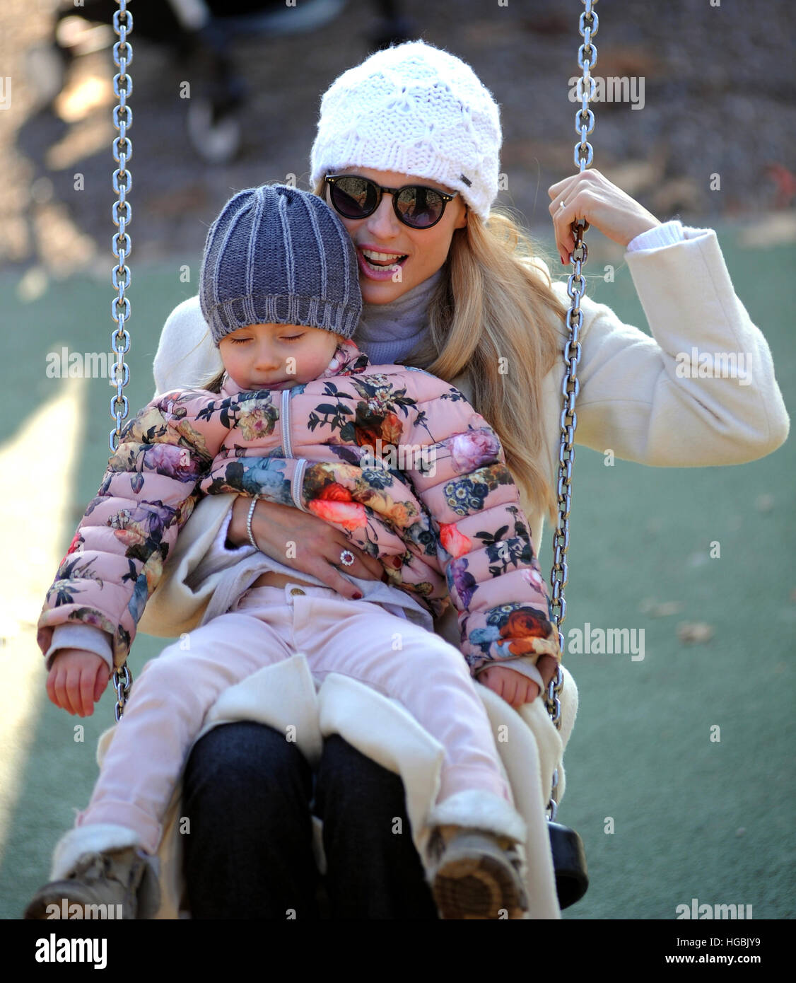 Michelle Hunziker takes her daughters Celeste and Sole to a local park ...