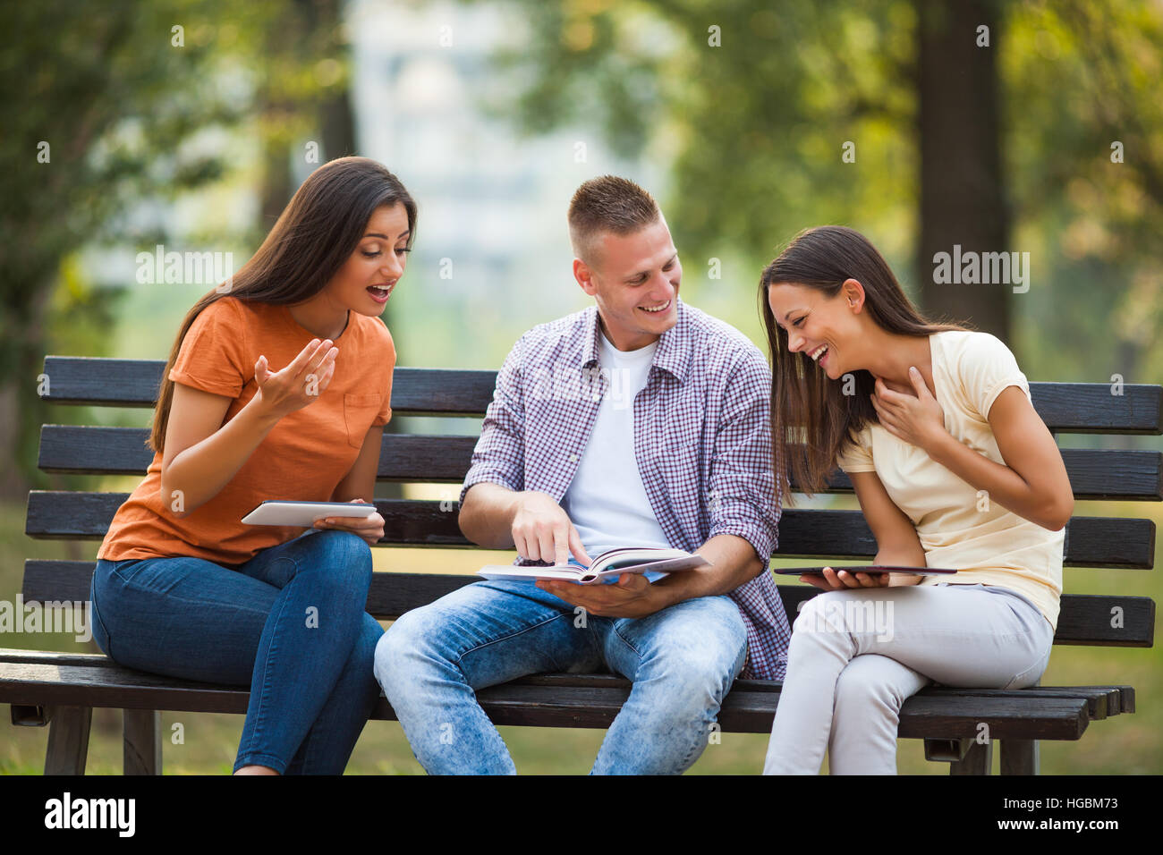 Students in park Stock Photo - Alamy