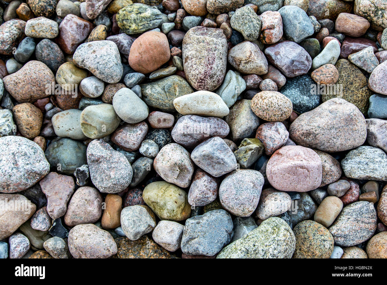 Many large and small pebbles stones, on a beach, island Ruegen, baltic ...