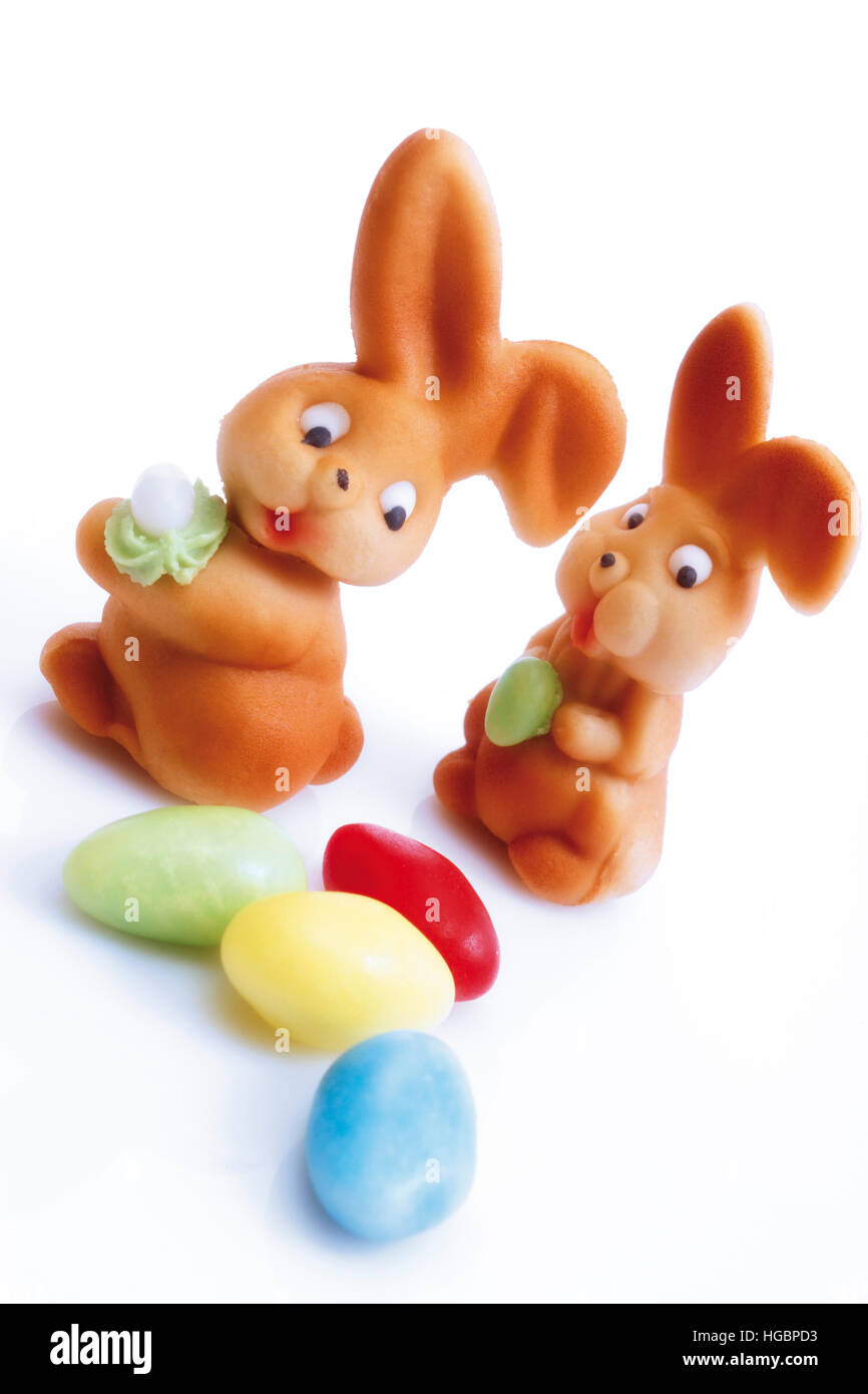 Marzipan bunny and candy eggs Stock Photo - Alamy
