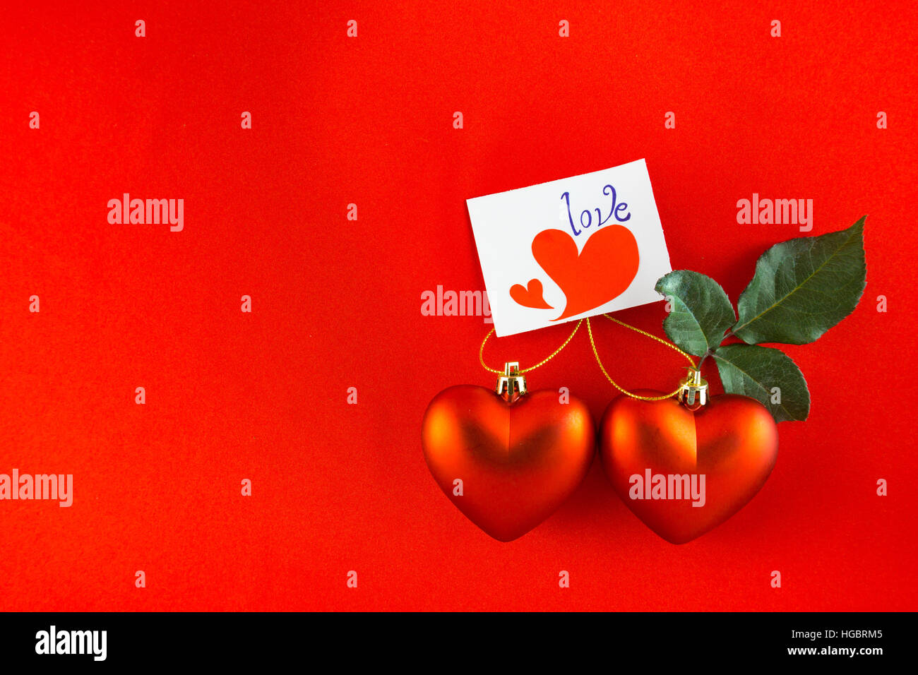 Red heart Valentines with message card on red background. Image of ...