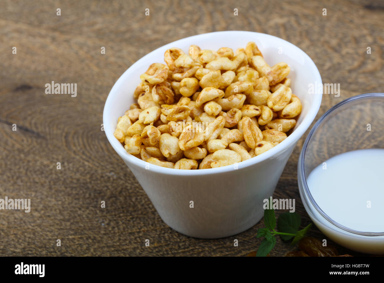 Rise flakes with milk, raisin and mint leaves Stock Photo - Alamy
